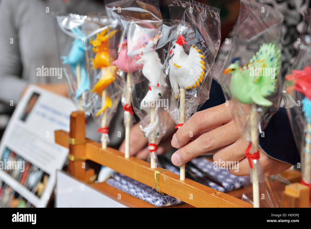 Preparation of traditional Japanese sugar candy sculptures Ame Zaiku by ...