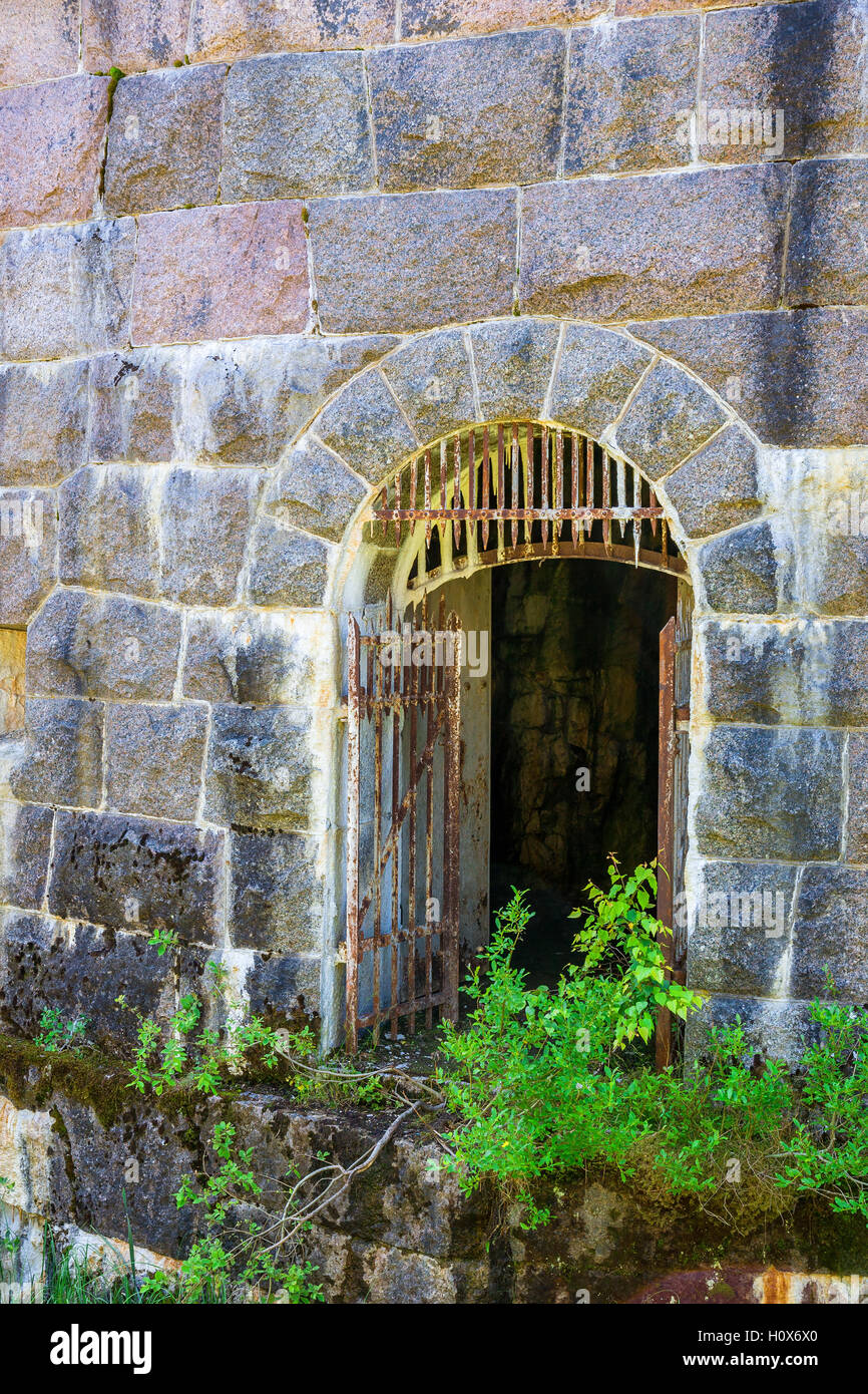 Iron gate in the moat to an old fortress Stock Photo - Alamy