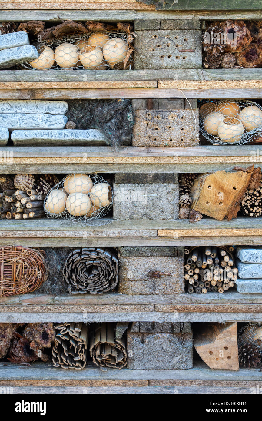 Insect home made using old wooden pallets for encouraging insects ...