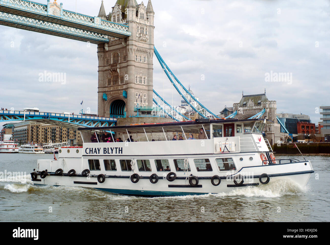 Chay Blyth Thames tourist river boat passing under Tower bridge London ...