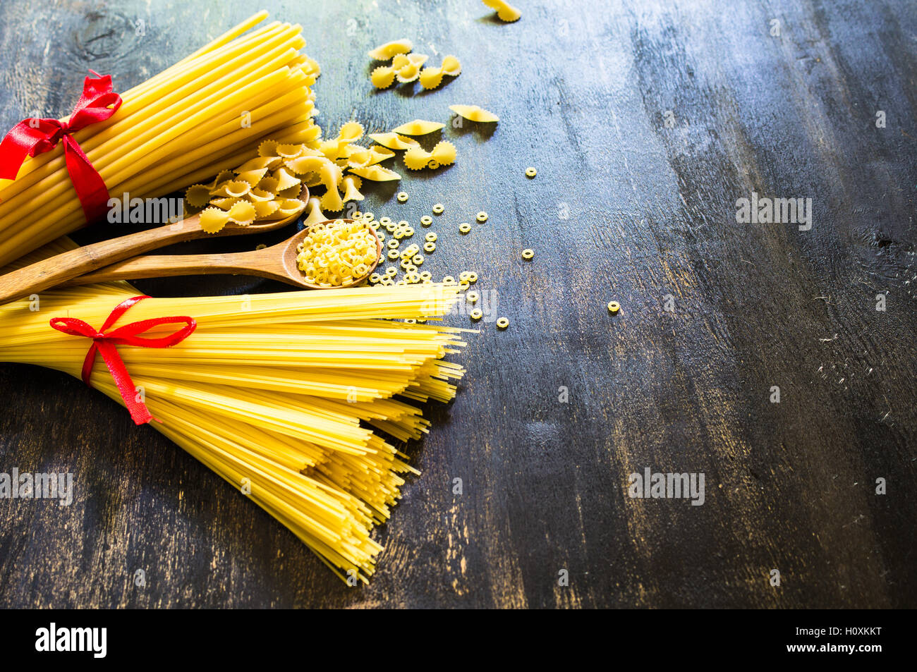 Pasta collection on rustic wooden background Stock Photo - Alamy