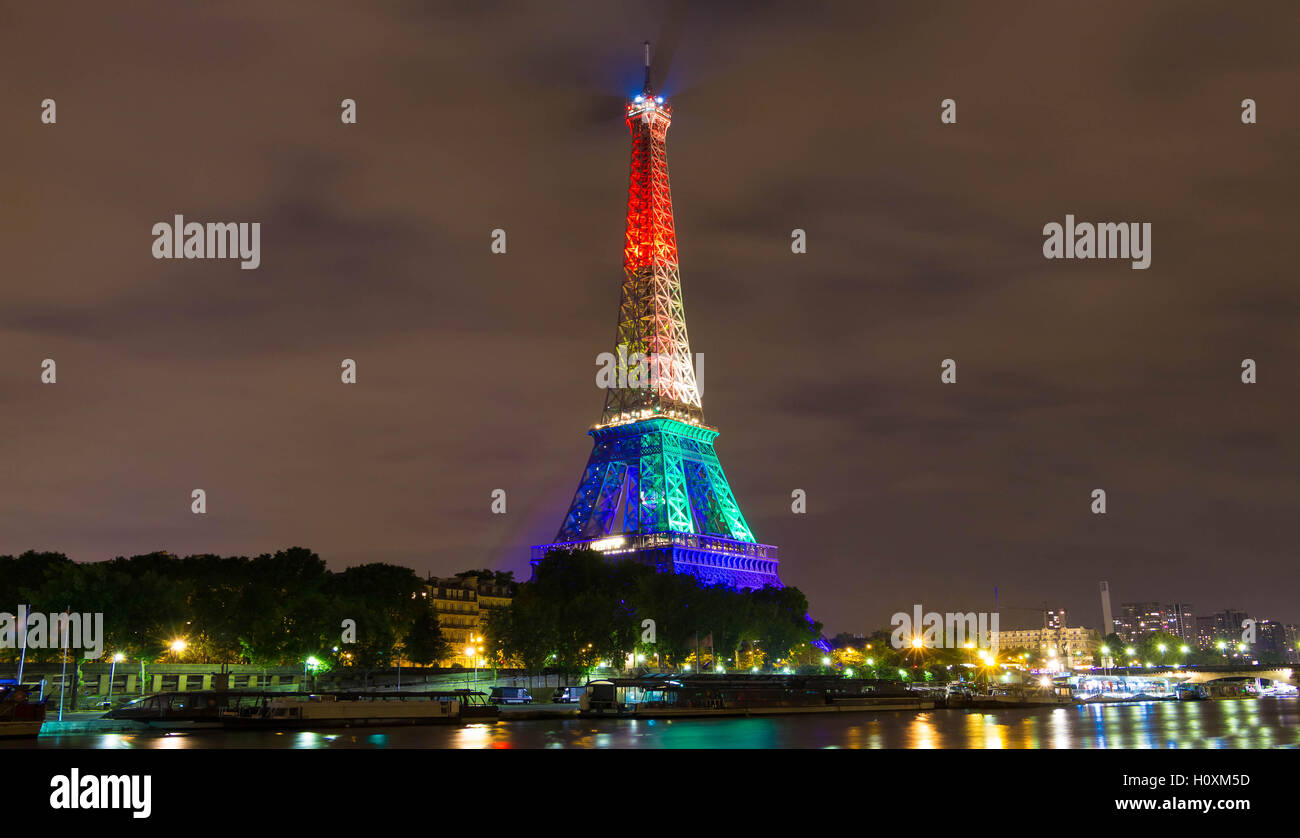 Paris; France-June 13, 2016 : The Eiffel tower lit up in colors of the ...