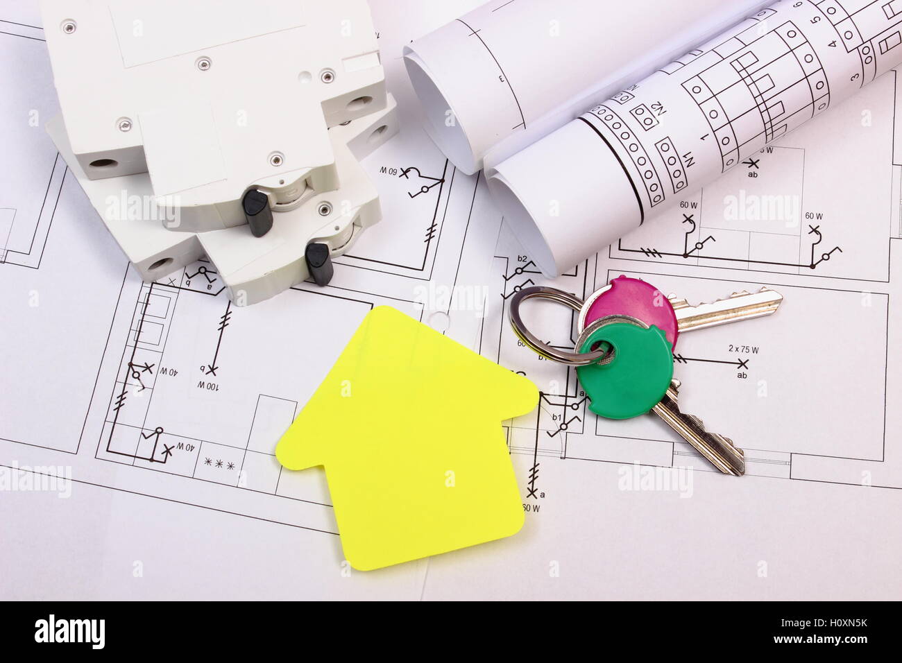 House of yellow paper, home keys, rolls of diagrams and electric fuse ...