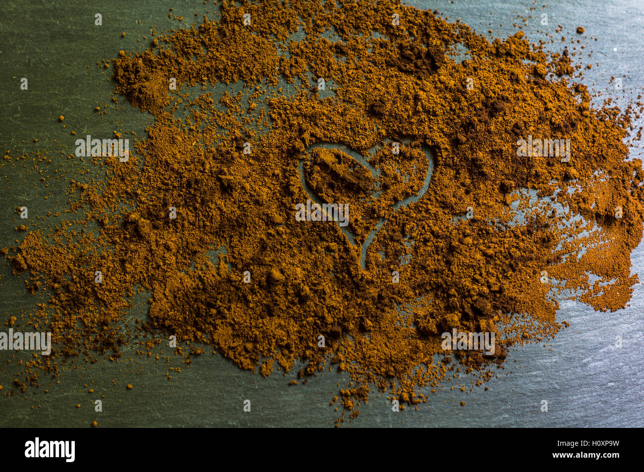 Love with dusting coffee on rustic wooden background Stock Photo - Alamy