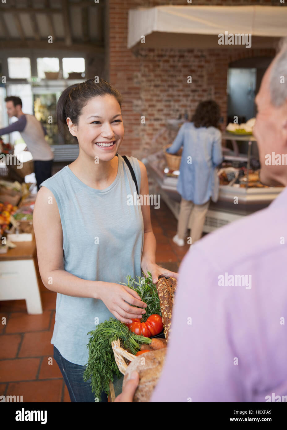 Woman checking grocery store hi-res stock photography and images - Alamy