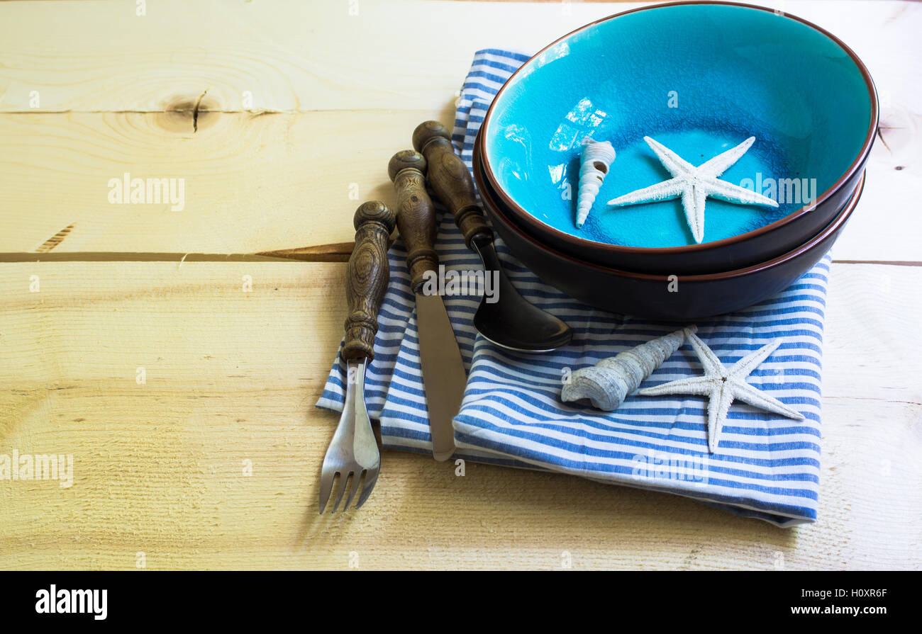 Rustic marine table setting with sea stars and vintage tablecloth Stock ...
