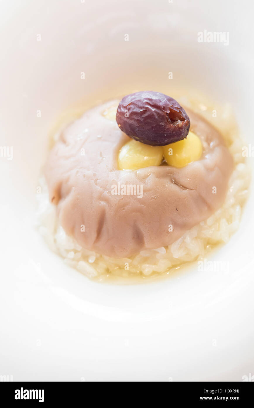 Chinese dessert, Chinese hot sticky rice and taro with ginkgo in sweet ...