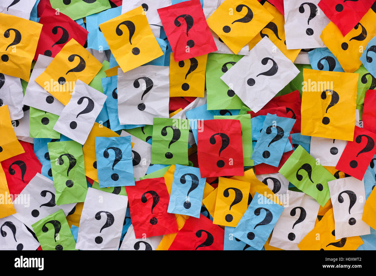 Too Many Questions. Pile of colorful paper notes with question marks ...