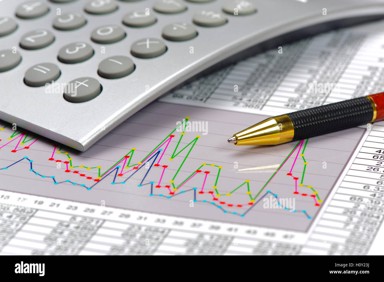 finance and calculation at stock market with chart and spreadsheet ...