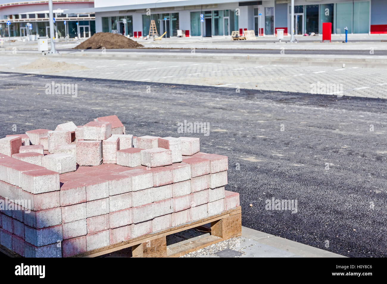 Pallet of stacked paving slabs is ready for usage placed at ...