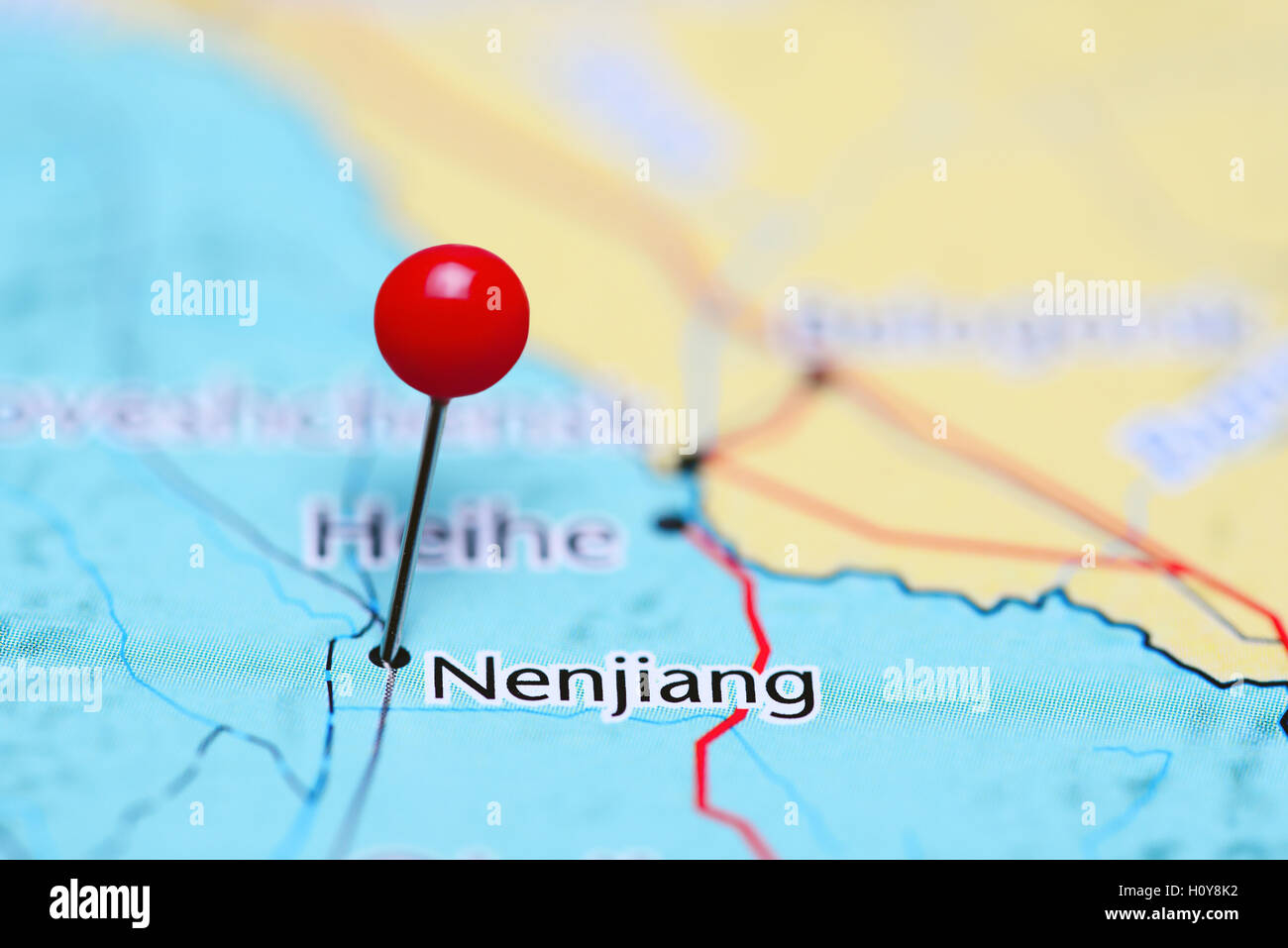 Nenjiang pinned on a map of China Stock Photo - Alamy