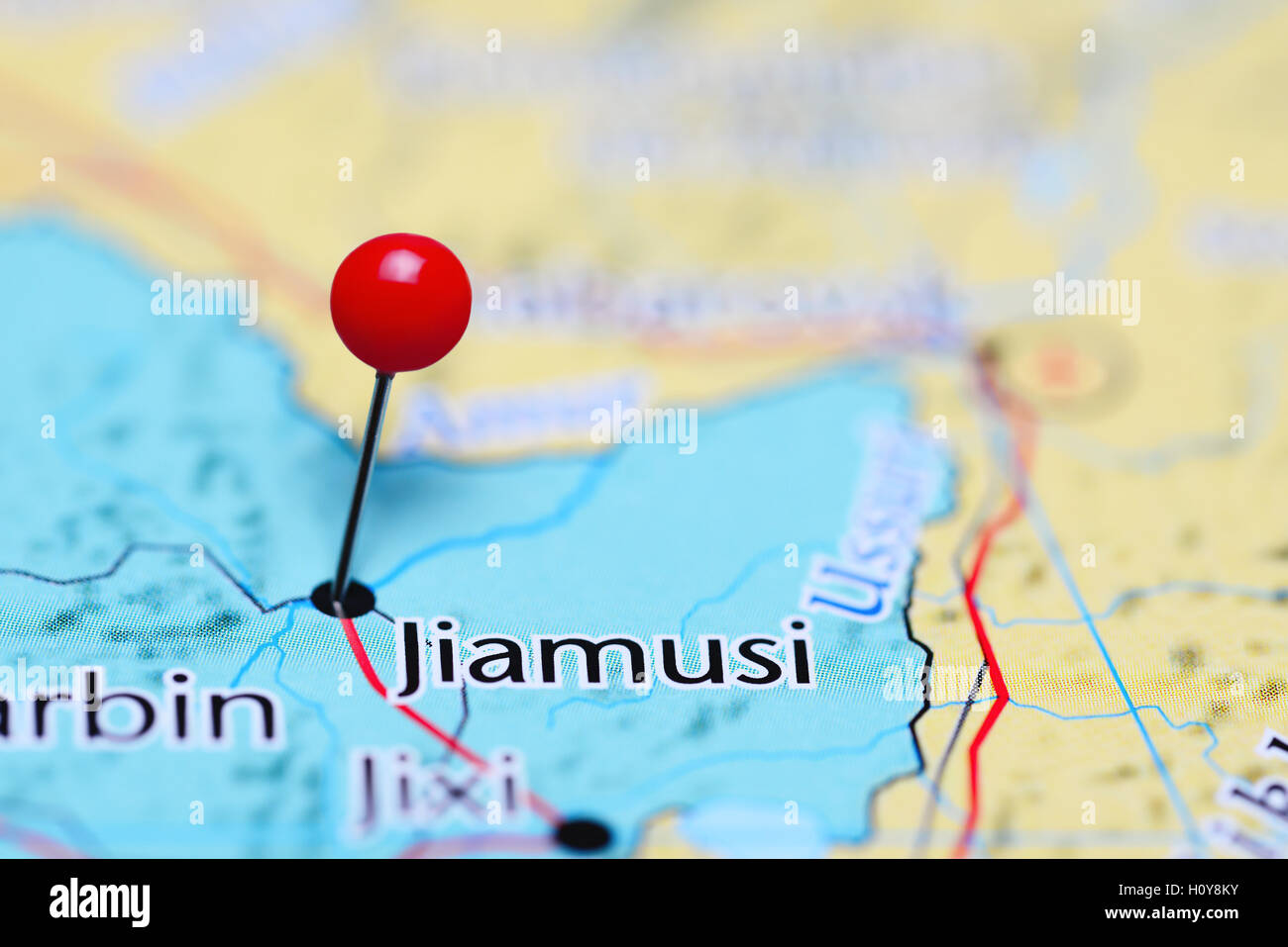 Jiamusi pinned on a map of China Stock Photo - Alamy
