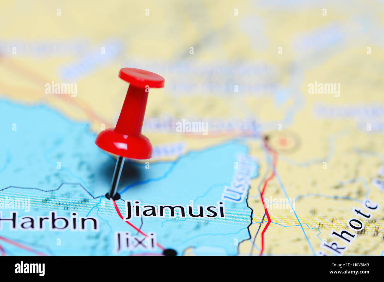 Jiamusi pinned on a map of China Stock Photo - Alamy
