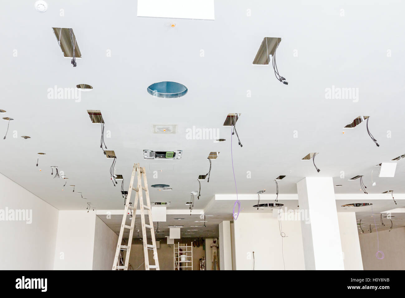 Workers are used wooden ladder to complete conditioning system ...