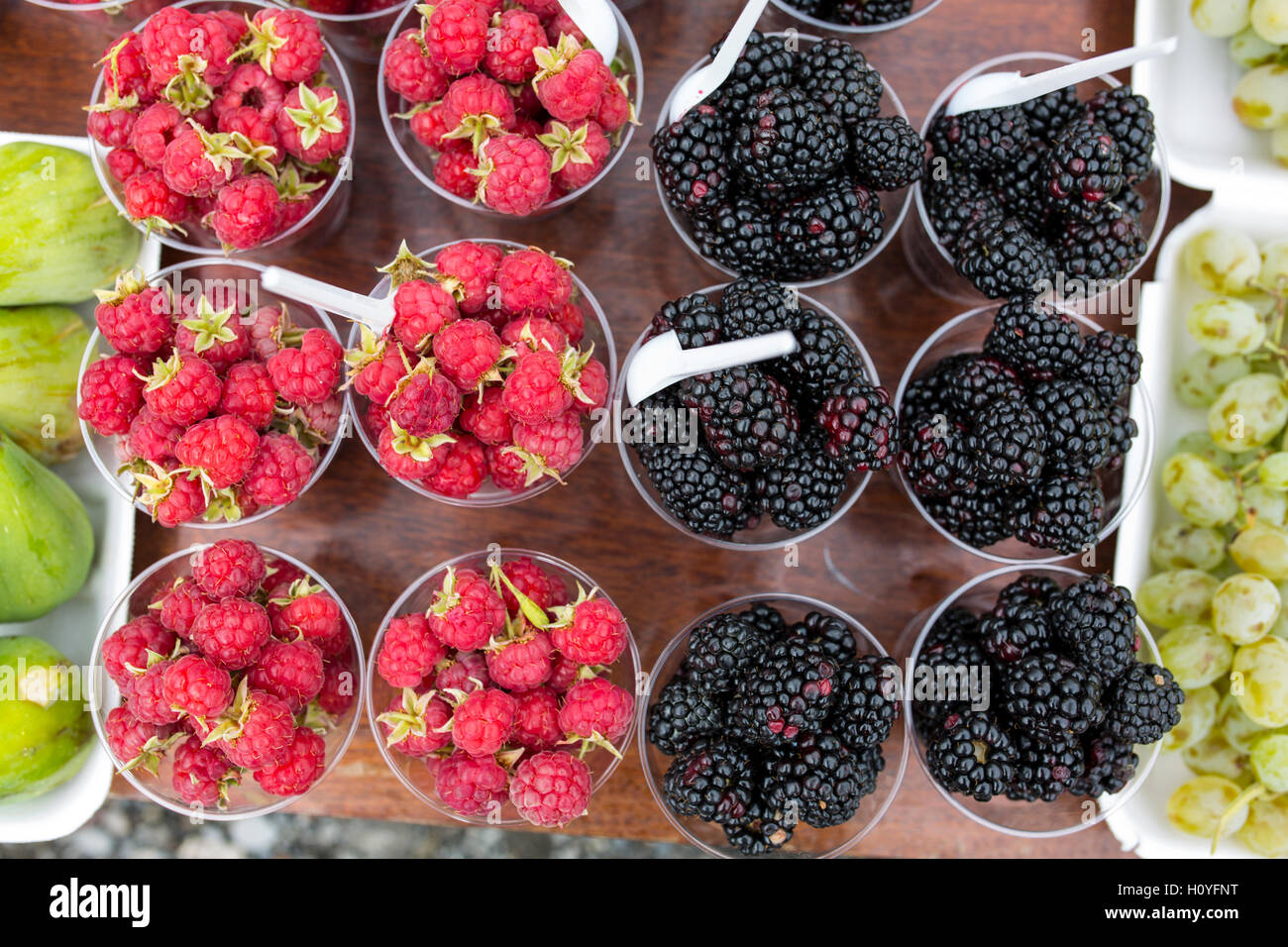 Fresh fruits and berries packed in boxes, exposed for buyers in Georgia ...