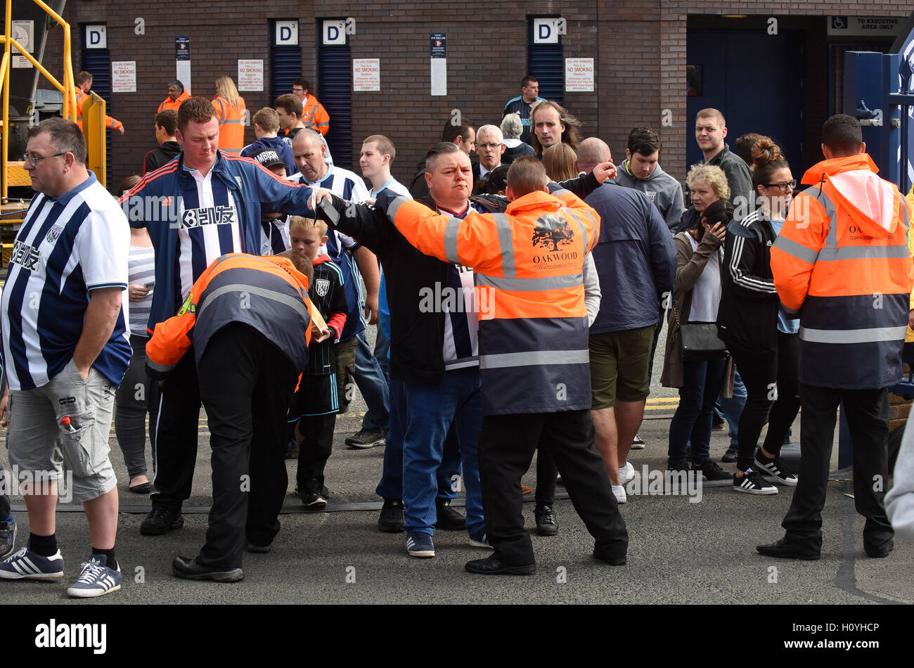 Football supporters fans being searched outside football stadium uk ...