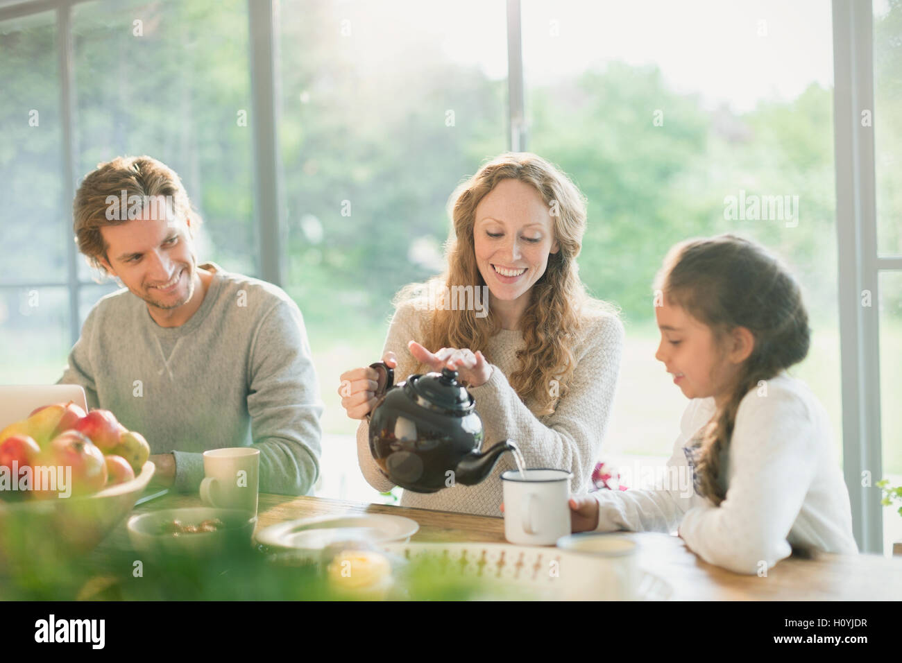 Daughter sharing tea hi-res stock photography and images - Alamy