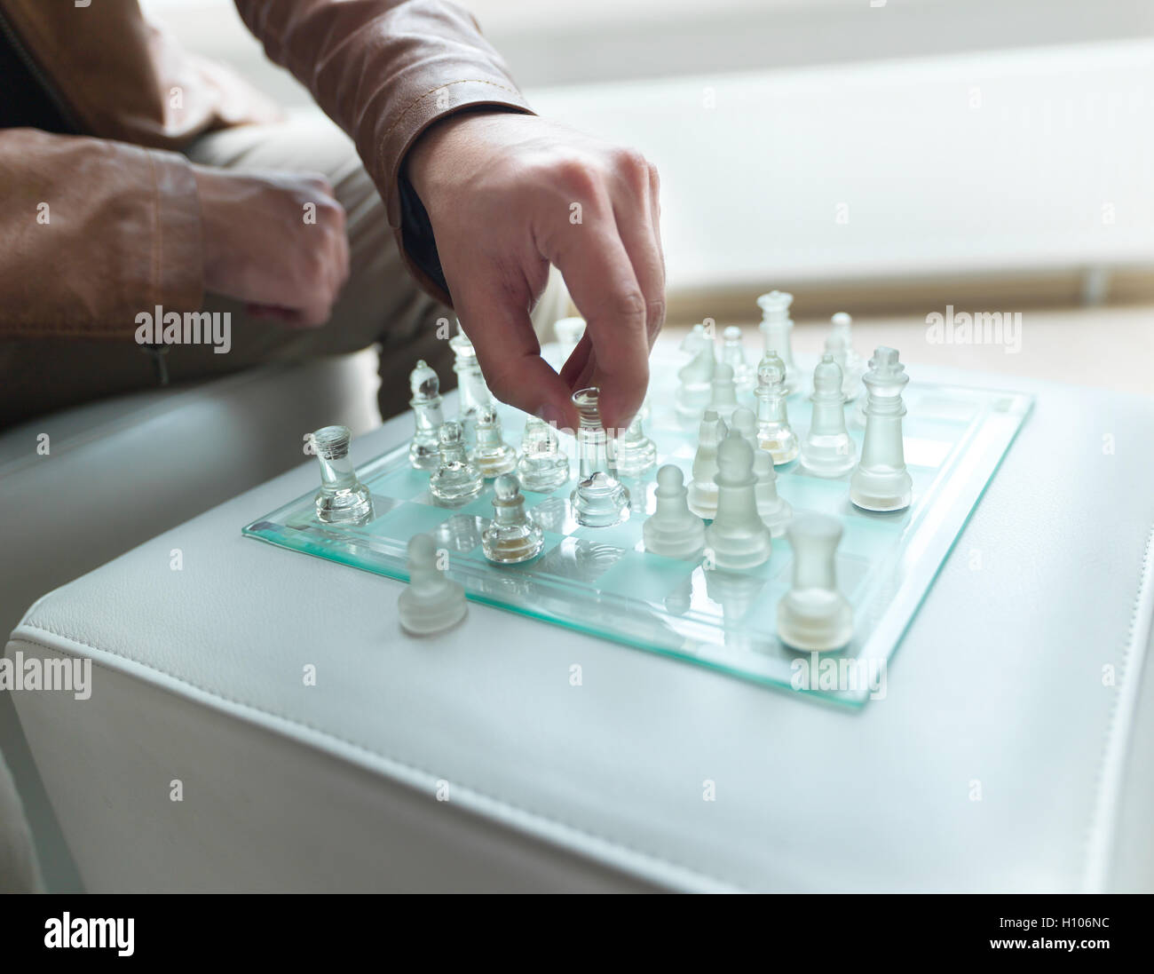 Close-up of player's hand executing his winning move Stock Photo - Alamy