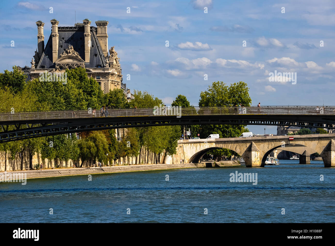 Paris, France. View from a boat on the river Seine. View east with ...