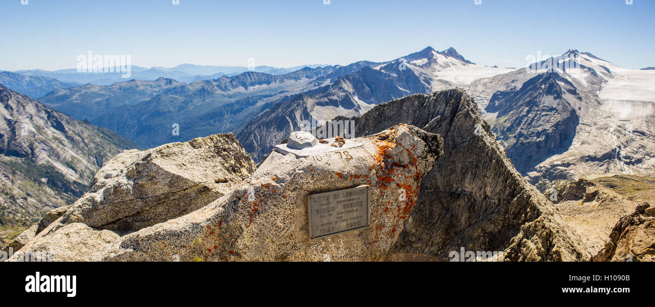 Rock and iron plate sign above Presena Peak. Val di Genova in ...