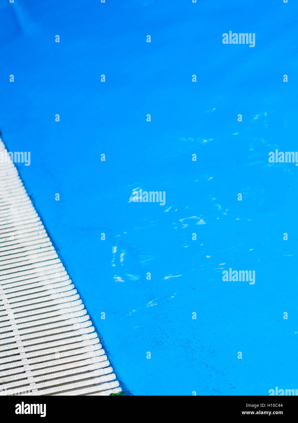 Outdoor pool with bright blue water Stock Photo - Alamy