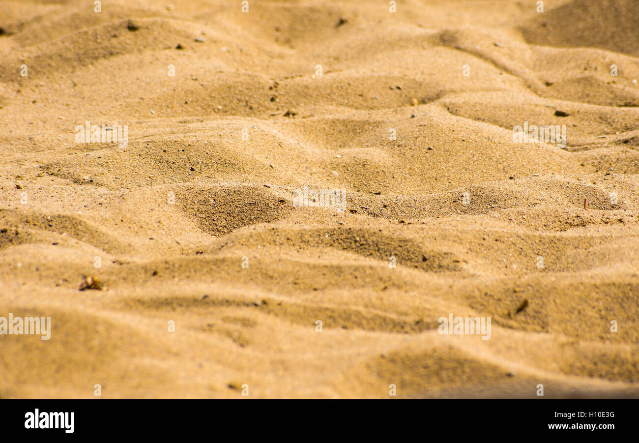 Bright yellow sand beach as a natural ackground Stock Photo - Alamy