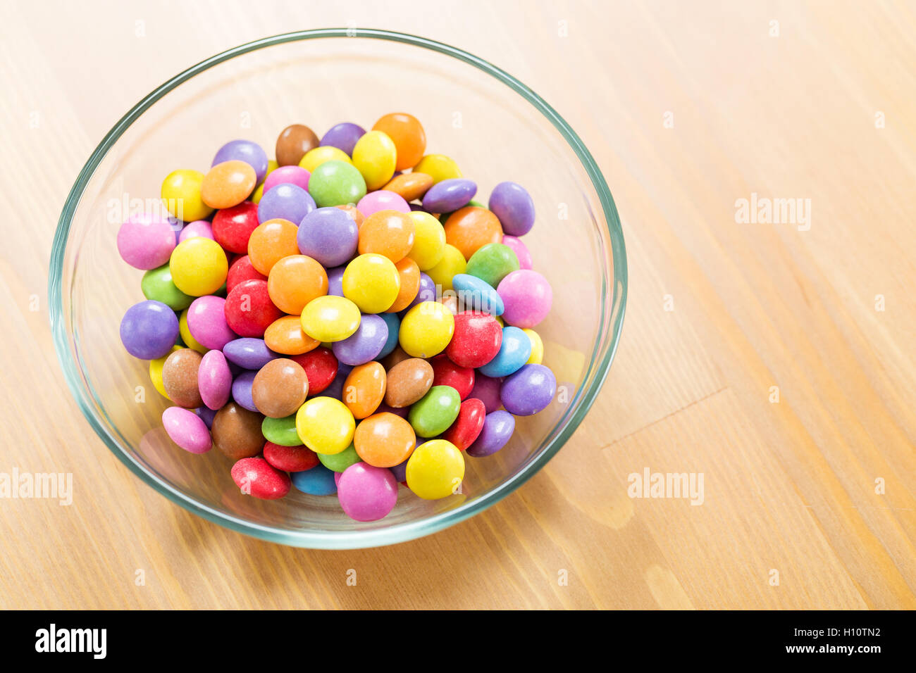 Chocolate candy in bowl Stock Photo - Alamy
