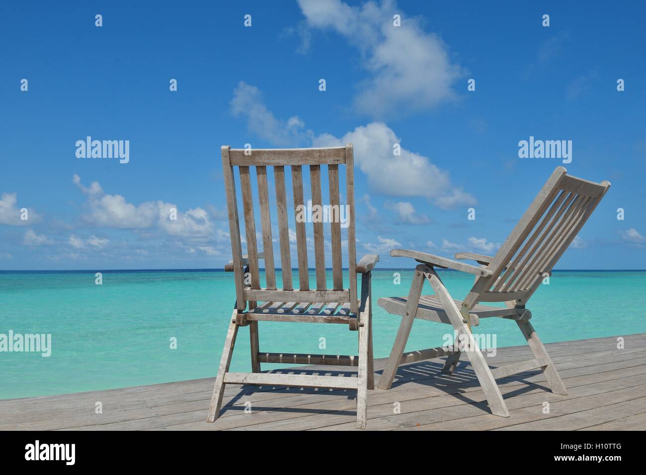 tropical beach chairs Stock Photo - Alamy
