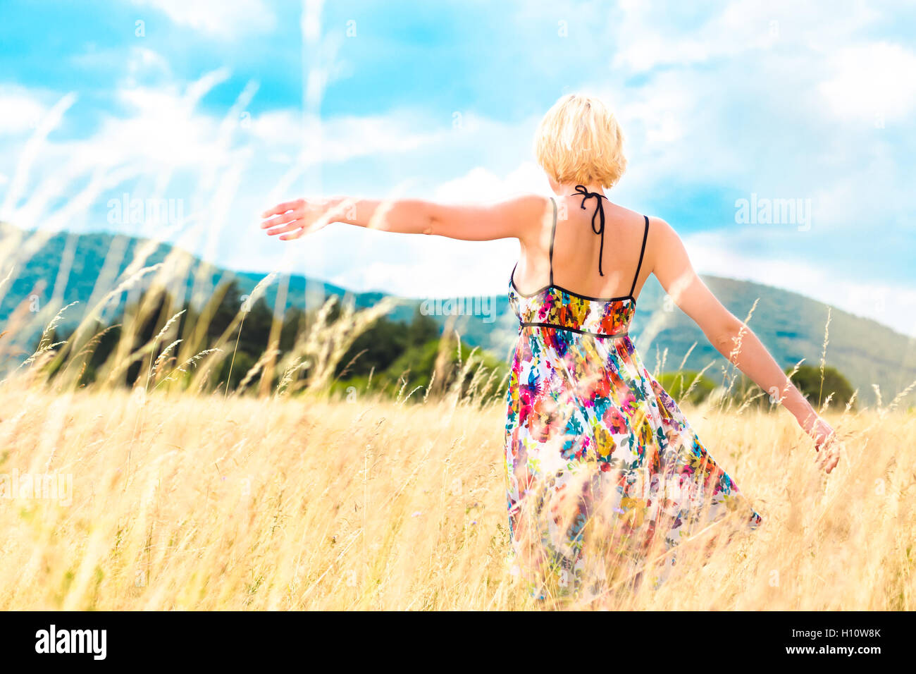 Woman enjoying the nature Stock Photo - Alamy