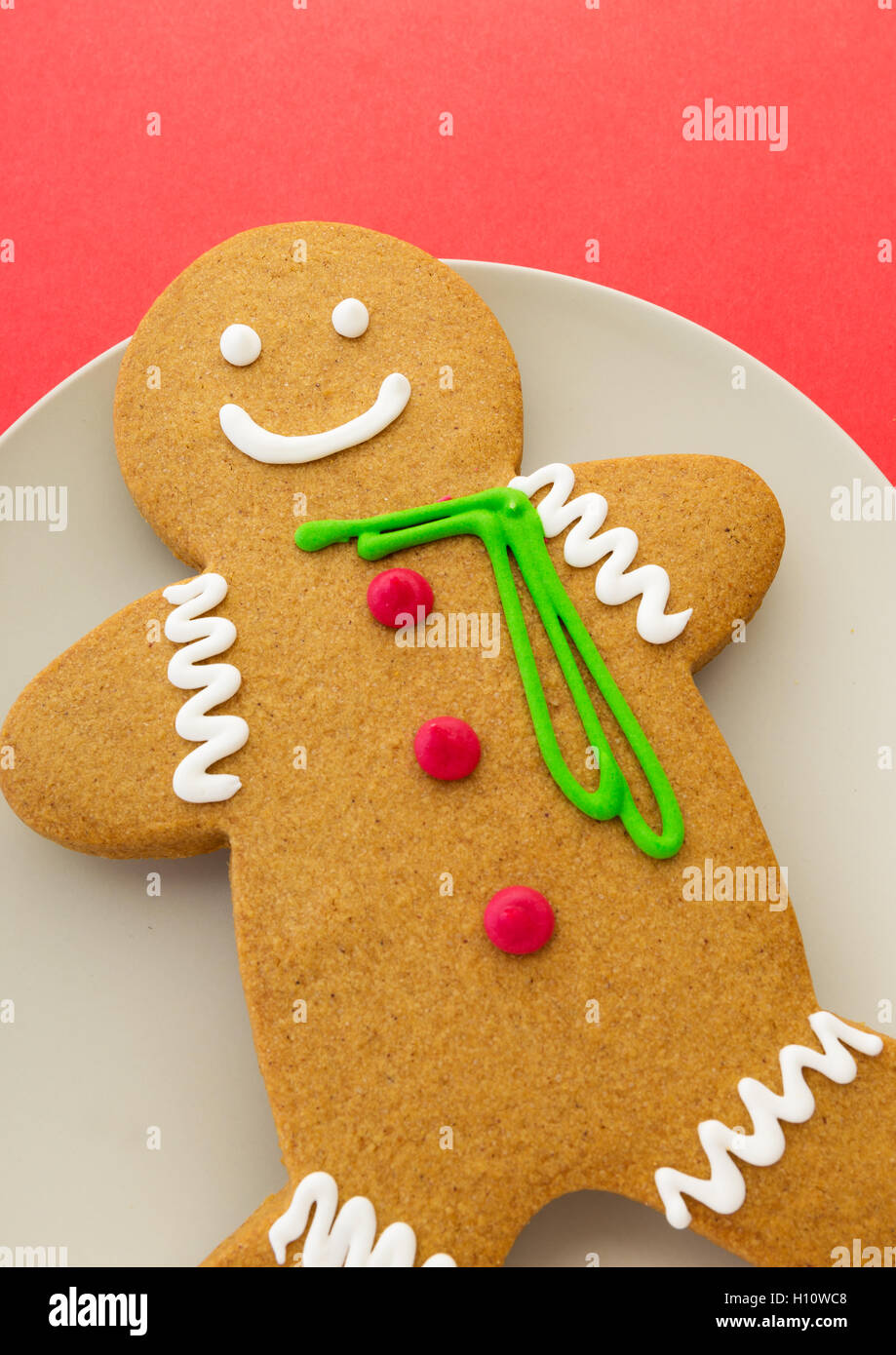 Gingerbread cookies with red background Stock Photo - Alamy