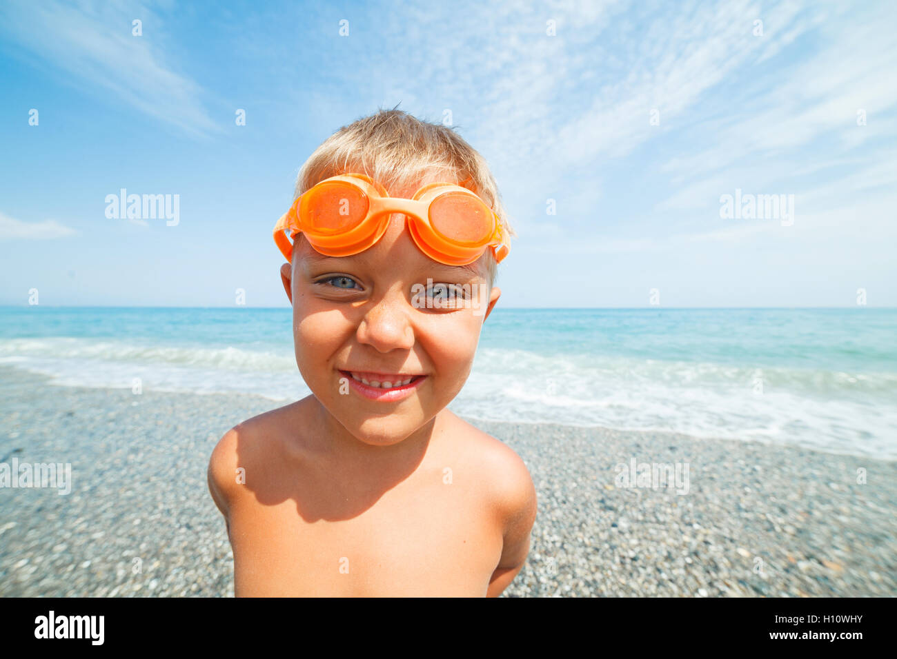 Boy on the beach Stock Photo - Alamy