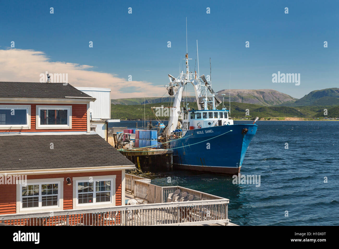 A fishing boat at the dock at Woody Point, Newfoundland and Labrador ...