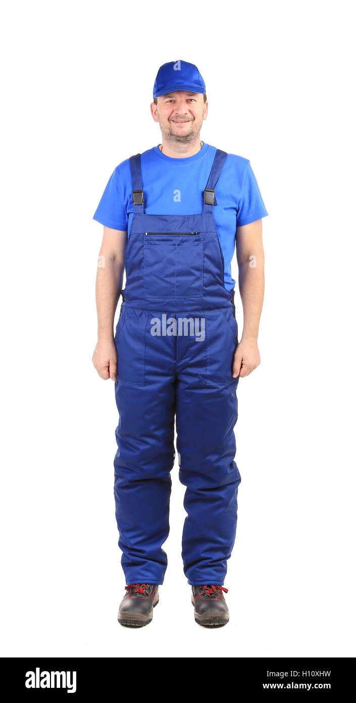 Worker in blue overalls Stock Photo - Alamy