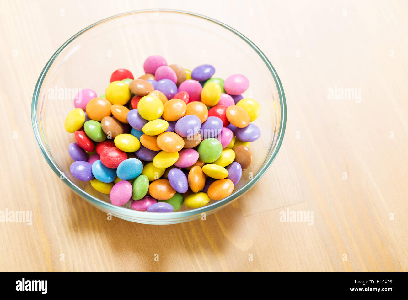 Chocolate candy in bowl Stock Photo - Alamy