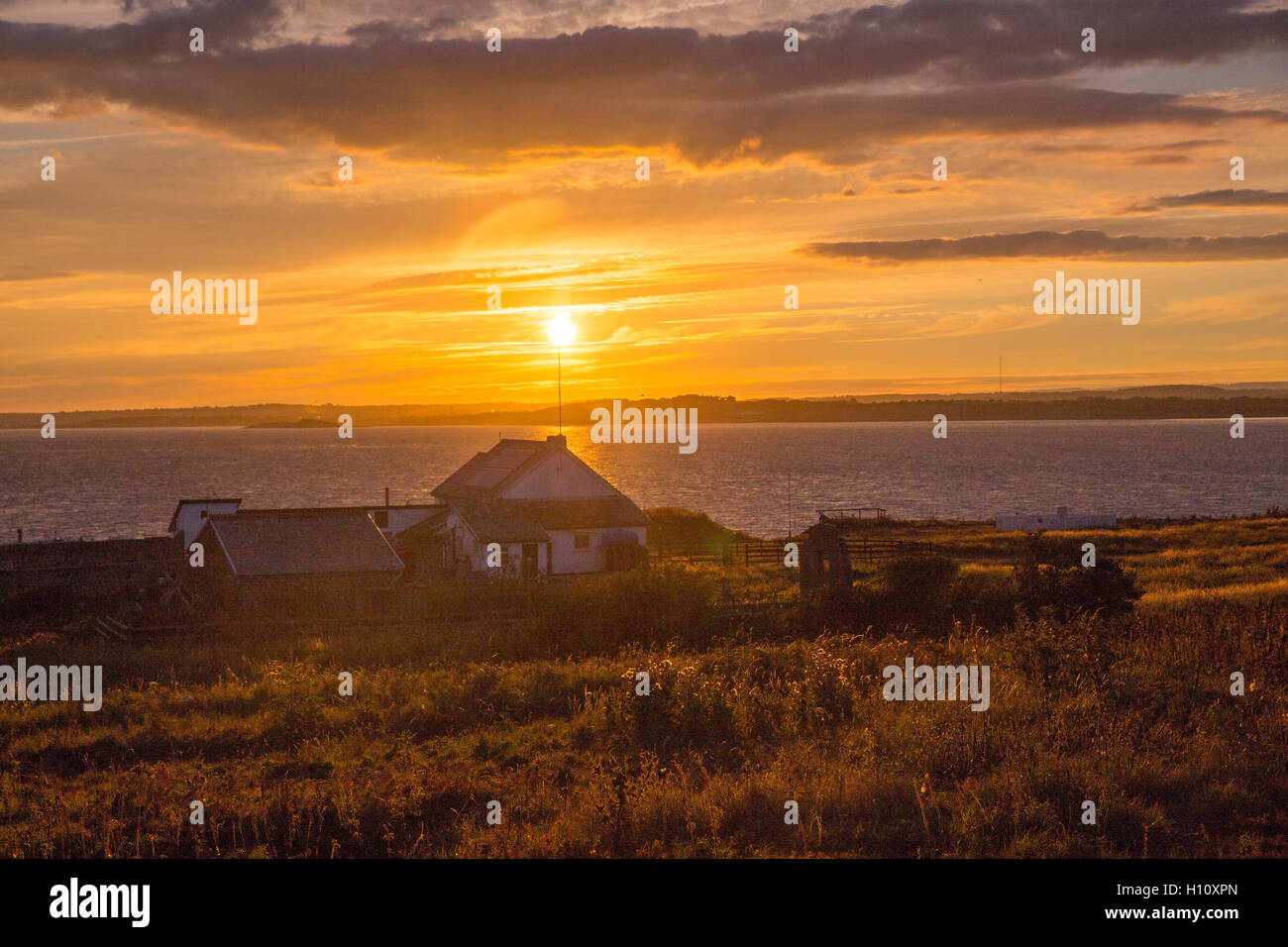 Flat Holm Island Farmhouse at sunset Stock Photo - Alamy