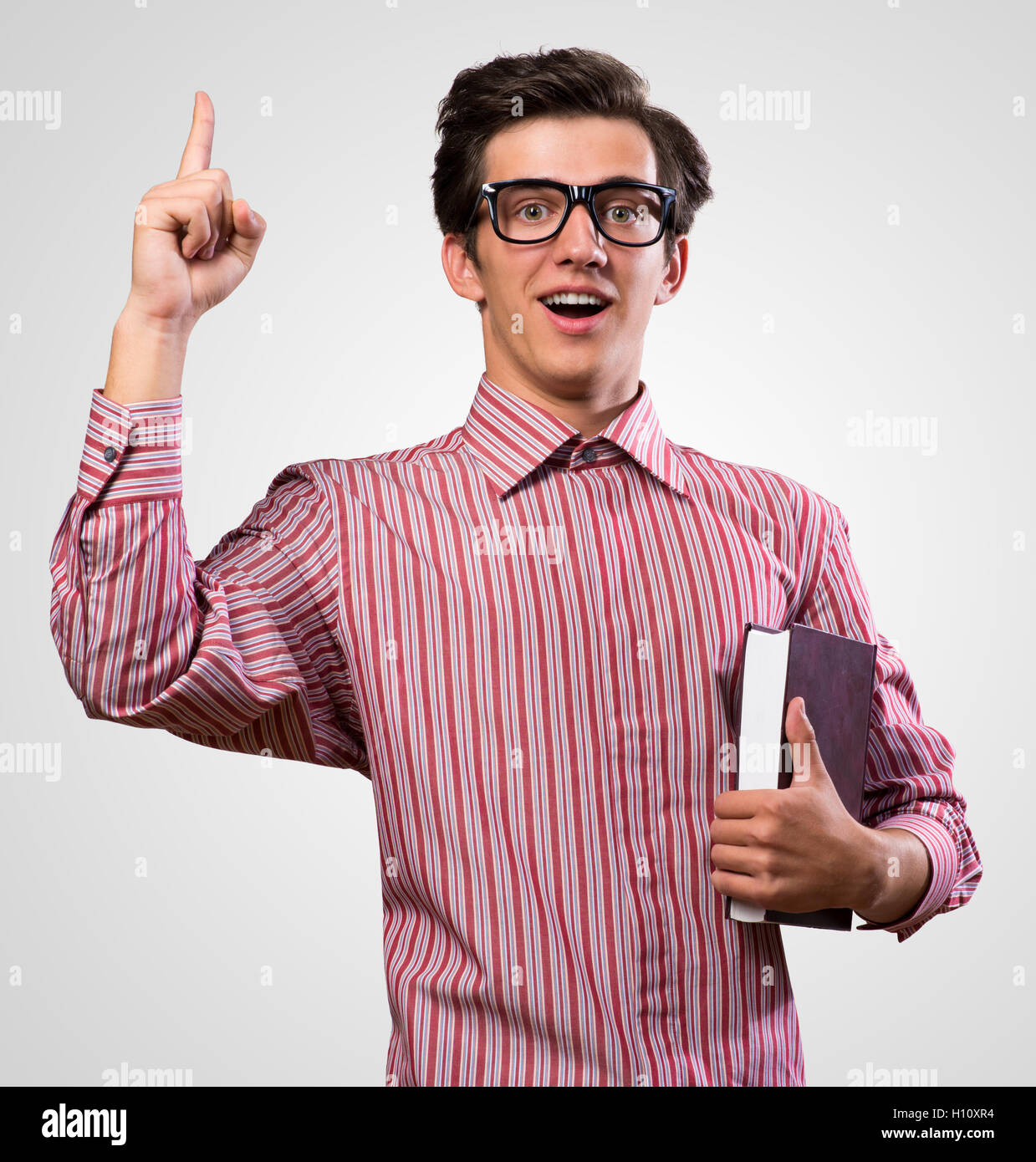 man raised his index finger Stock Photo - Alamy