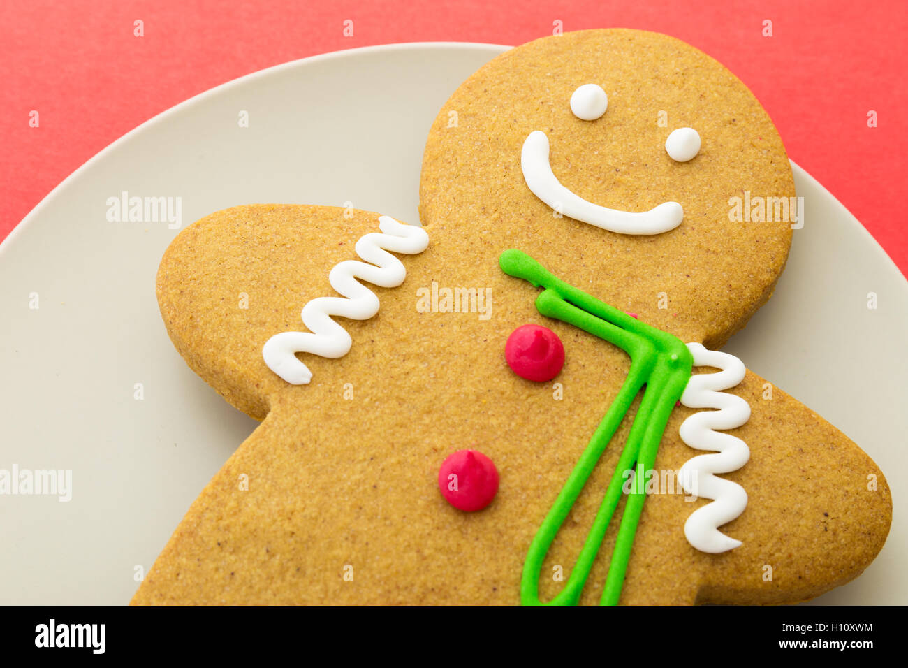 Gingerbread with red background Stock Photo - Alamy
