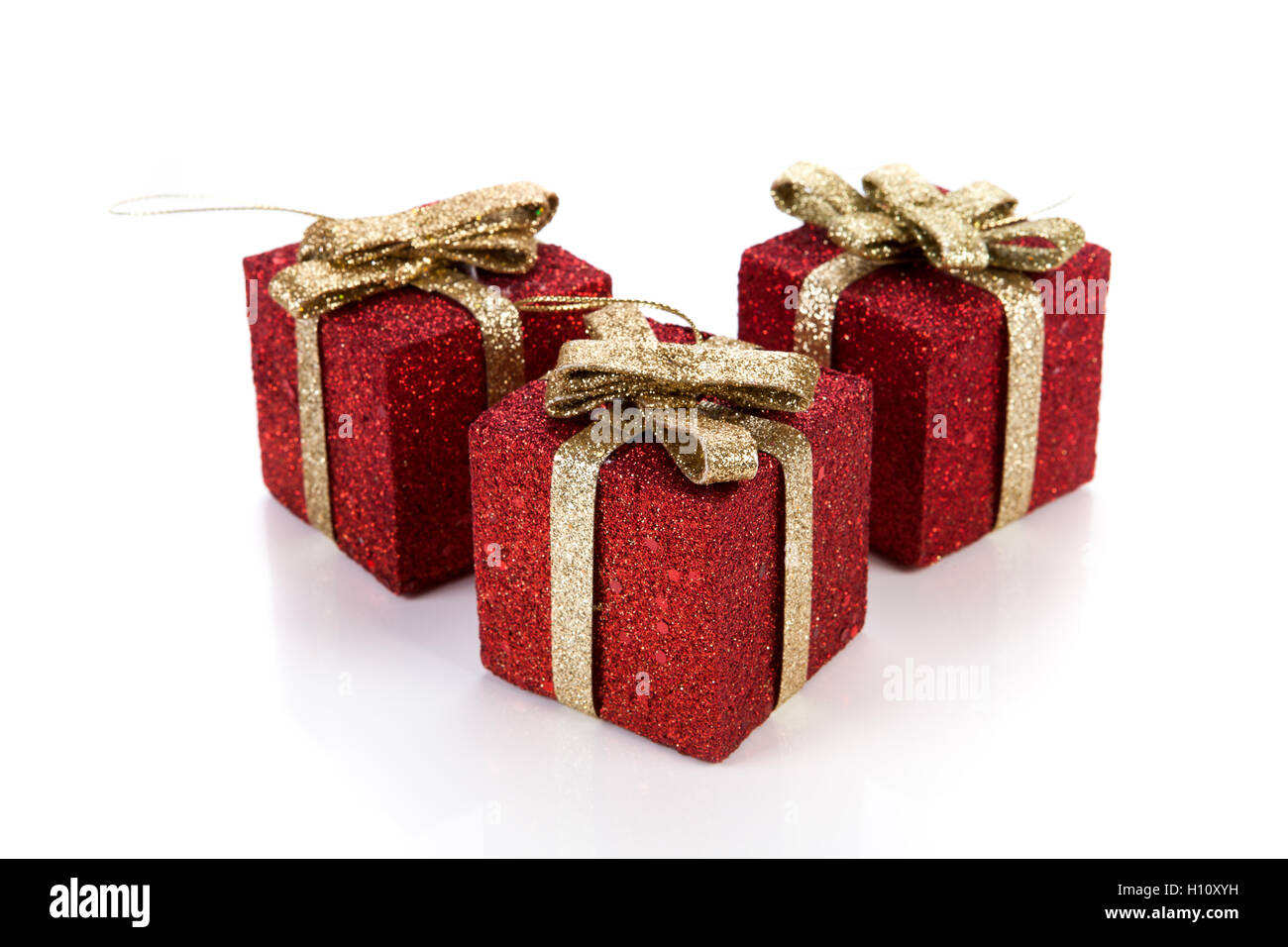 Artificial red gift boxes Stock Photo - Alamy