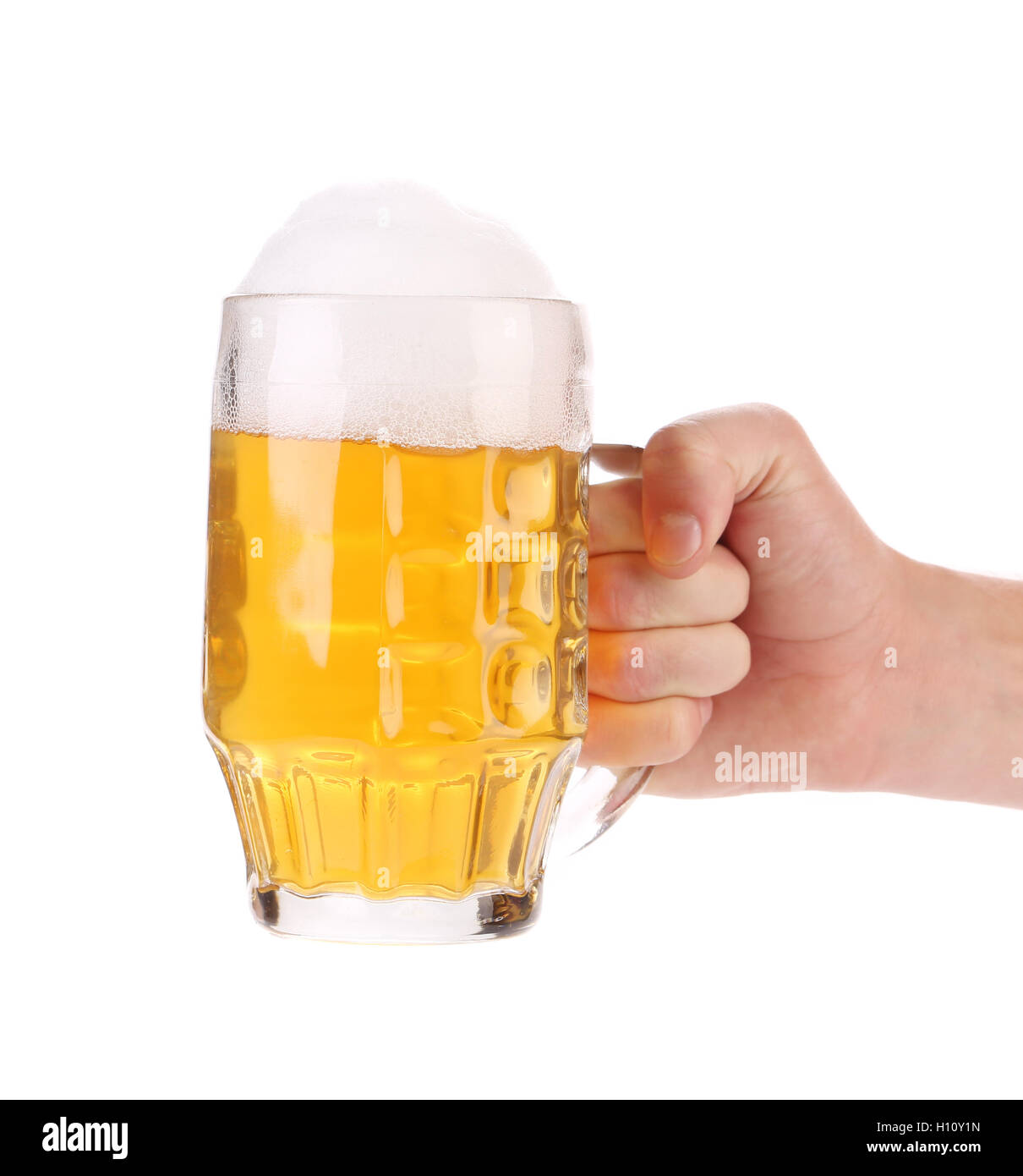 Man hand holds beer in mug Stock Photo - Alamy