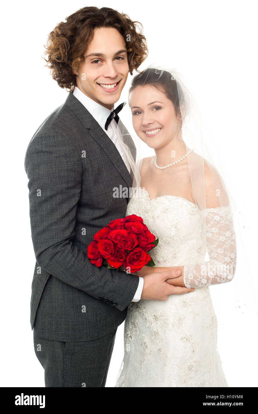 Wedding couple posing together Stock Photo - Alamy