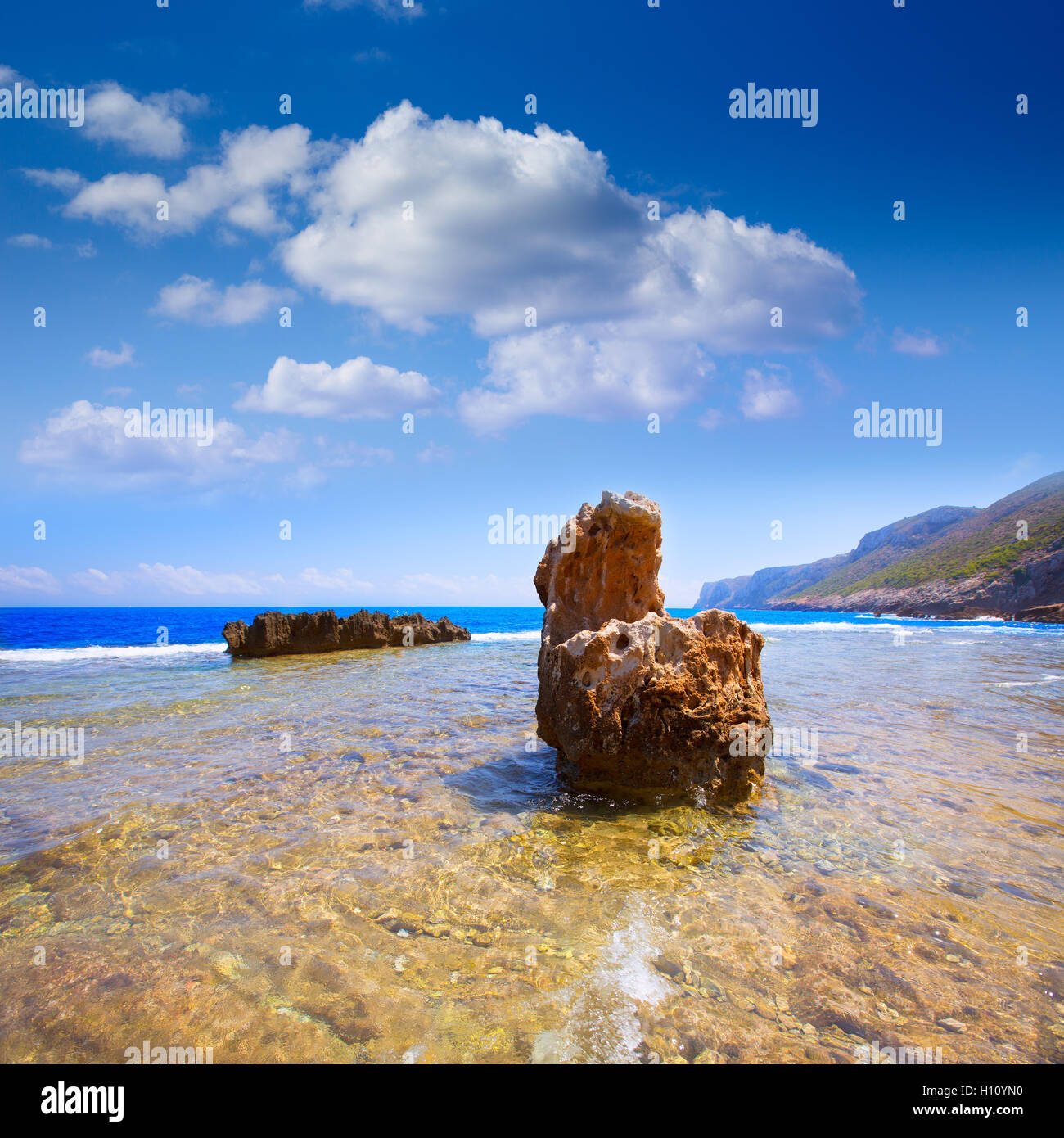 Denia Alicante Las rotas rocky beach in Spain Stock Photo - Alamy