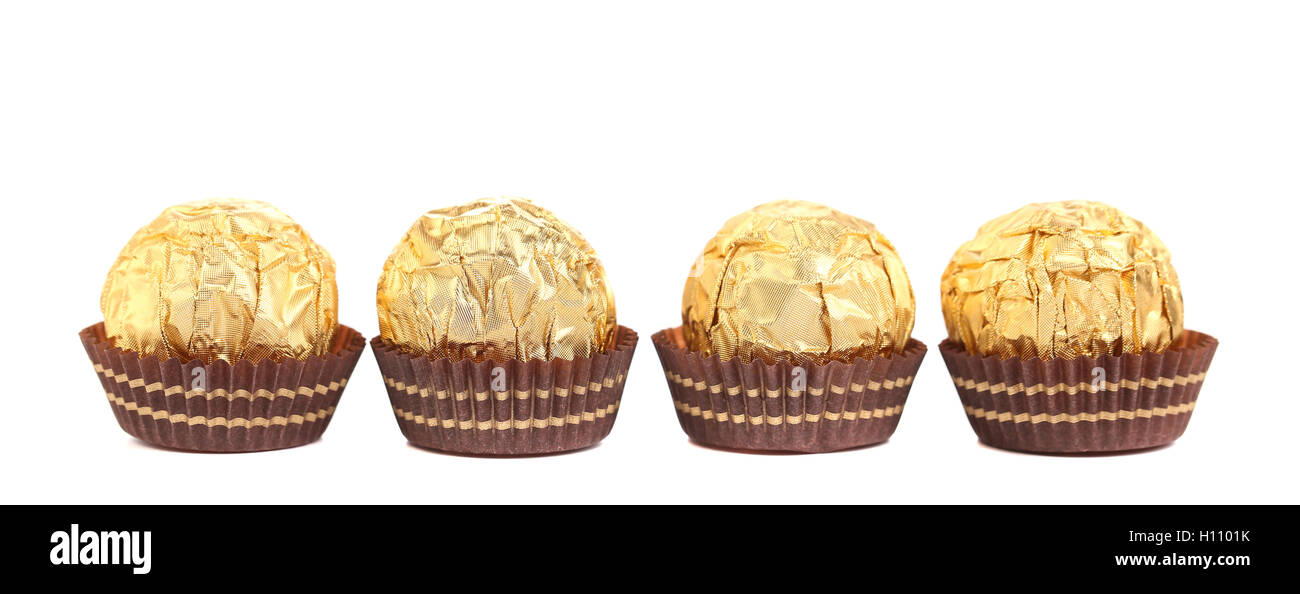 Four in row chocolate bonbons Stock Photo - Alamy