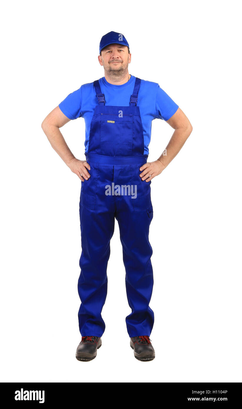 Worker in blue overalls Stock Photo - Alamy