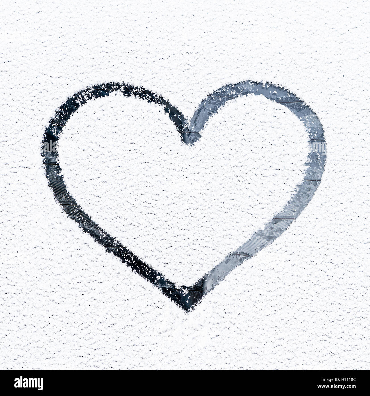 Heart drawn on frosty window Stock Photo - Alamy