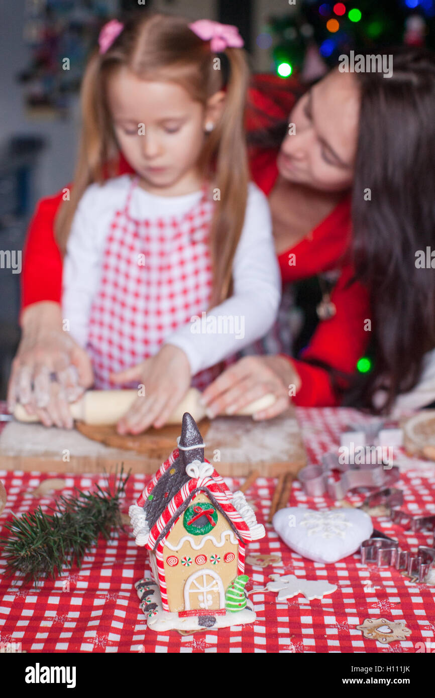 Gingerbread fairy house decorated by colorful candies on a background ...