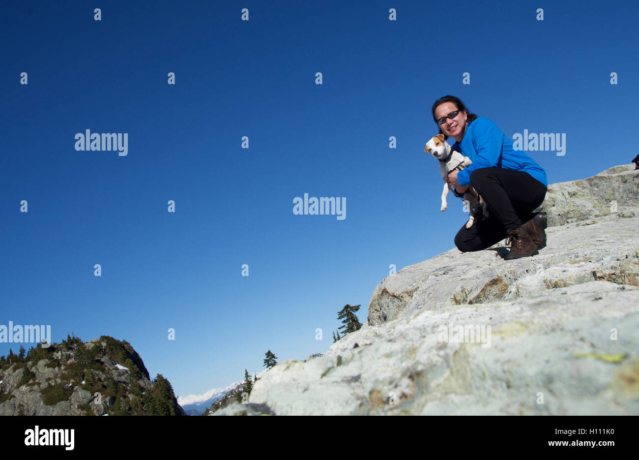 Chinese Canadian Man Hiking with Jack Russell Dog on British Columbia's ...