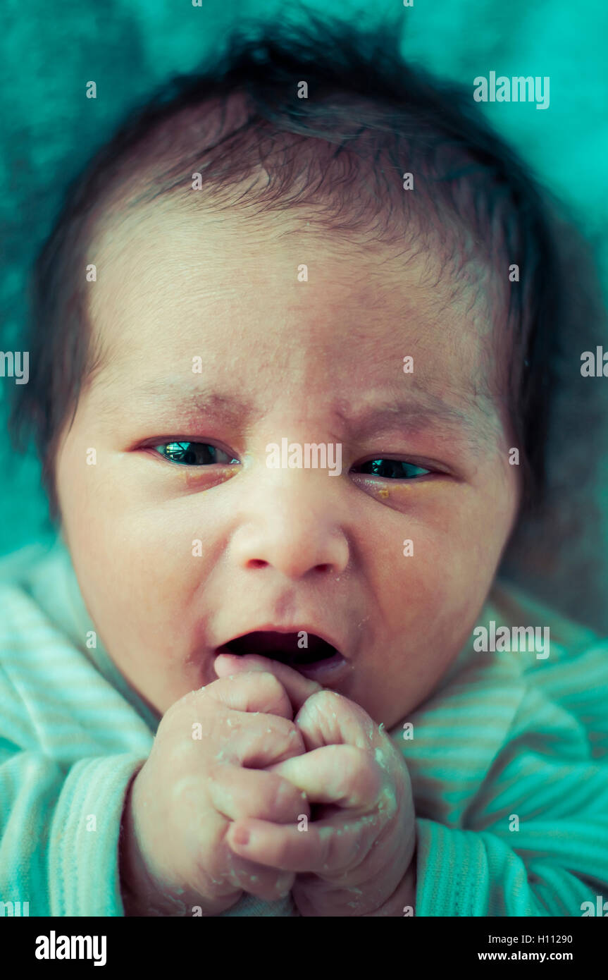 Emotion, Newborn peacefully sleeping, picture of a baby curled u Stock ...
