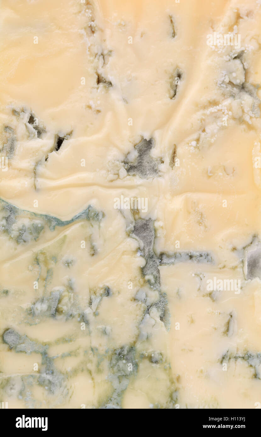 Slice of dor blue cheese Stock Photo - Alamy