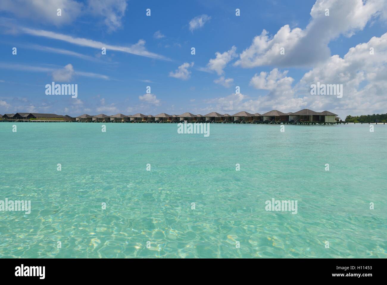 tropical water home villas Stock Photo - Alamy