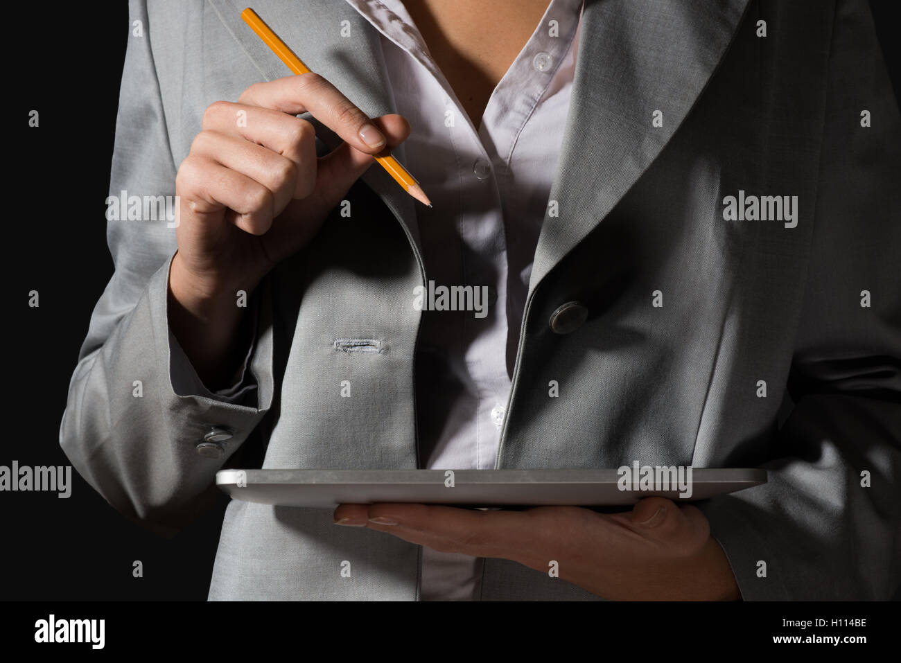 business woman with tablet and pencil Stock Photo - Alamy